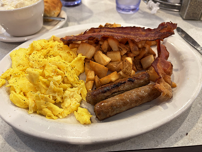 The breakfast trinity &ndash; fluffy scrambled eggs, crispy bacon, and sausage links that snap with each bite. Hallelujah!