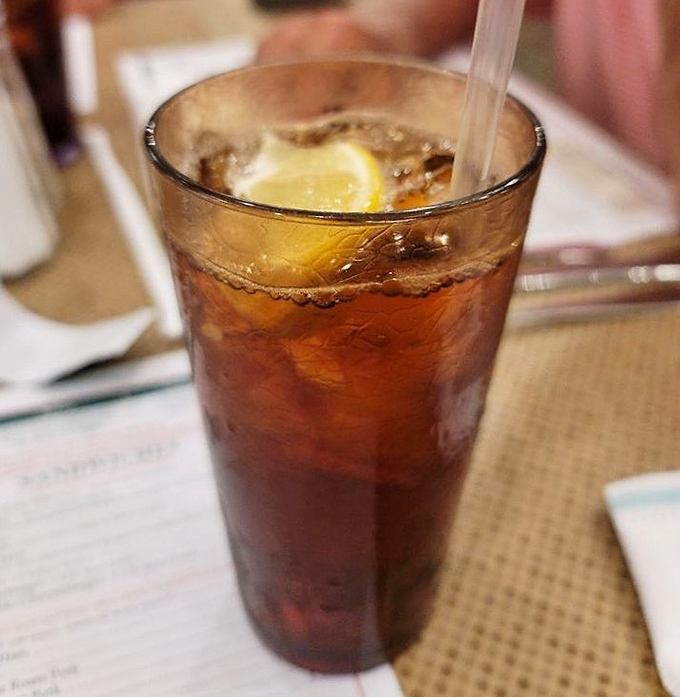 This isn't just iced tea—it's liquid amber with a lemon crown, the unofficial champagne of Midwestern dining.