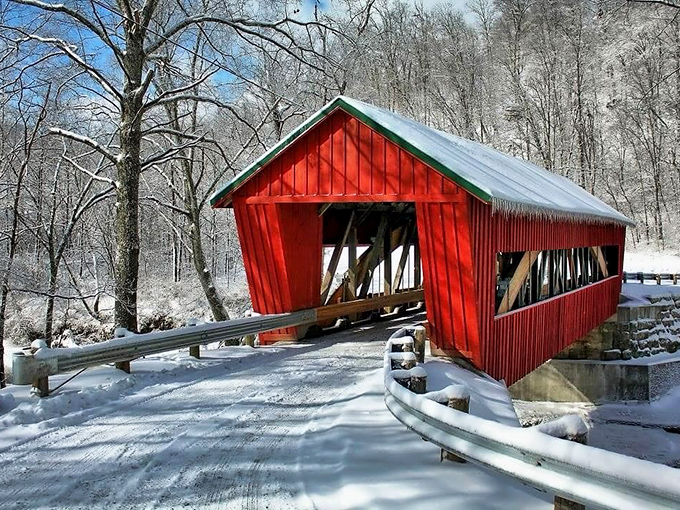 Winter transforms the bridge into a holiday card come to life. Snow-dusted and serene, it's Ohio's answer to a Norman Rockwell painting.