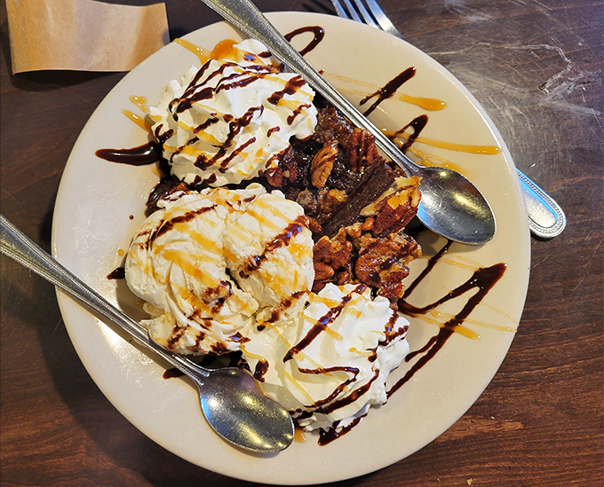 A brownie sundae that doesn't just satisfy your sweet tooth—it throws your sweet tooth a parade complete with ice cream and drizzles.
