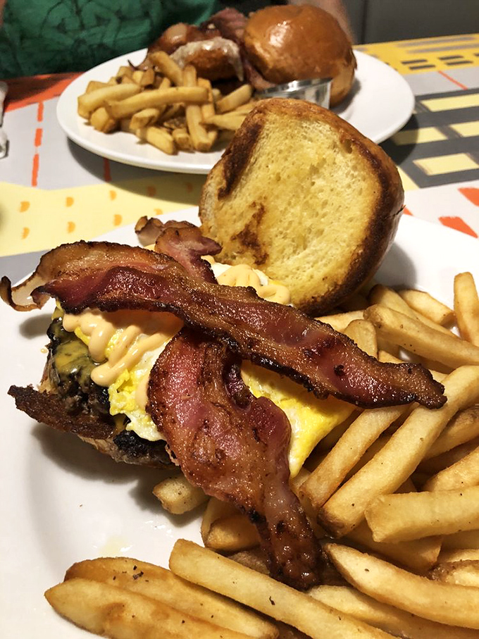 This isn't just breakfast on a bun&mdash;it's morning architecture. Layers of egg, bacon, and cheese create the foundation of a perfect day.