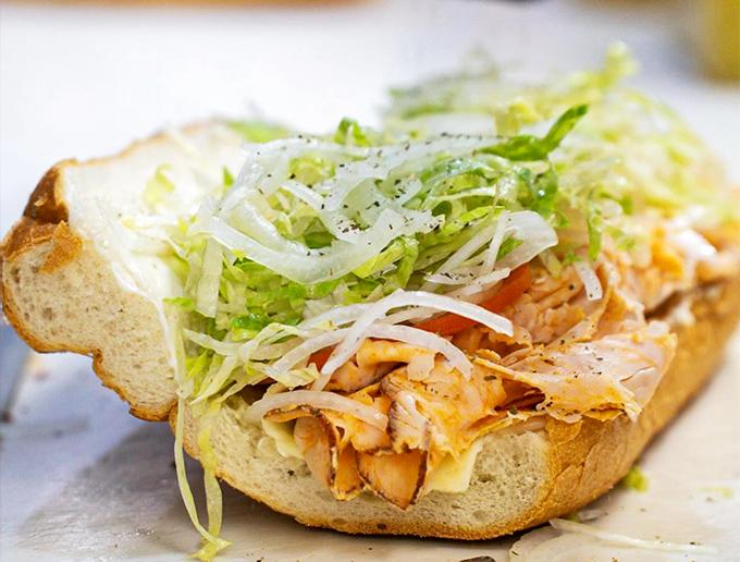 A buffalo chicken hoagie topped with shredded lettuce proves that Ricci's isn't just about tradition&mdash;they know how to satisfy modern cravings too.