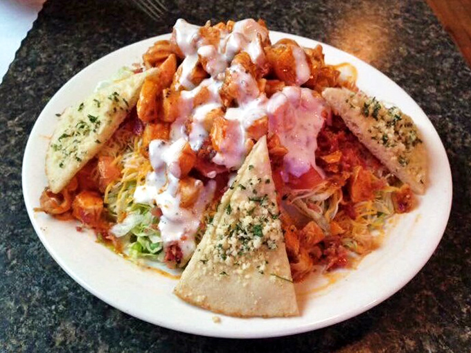 When buffalo chicken meets fresh salad, it's like introducing your wild friend to your sensible one&mdash;surprisingly, they get along beautifully.