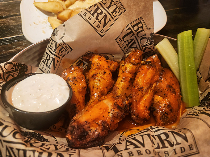Wings that glisten with sauce like jewels, ready to test your napkin supply and spice tolerance.