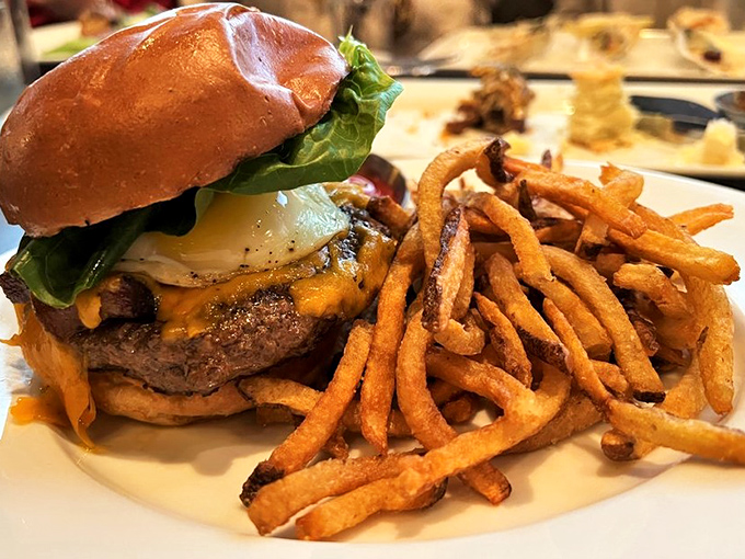 The burger at Orsay isn't just a burger&mdash;it's a masterclass in balance, with a golden brioche bun, melted cheese, and fries that deserve their own fan club.