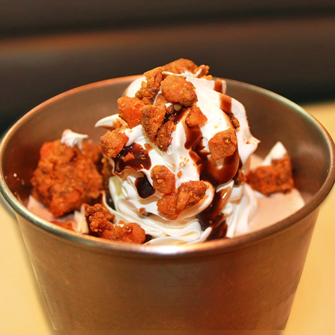 Dessert that understands its mission&mdash;ice cream elevated to art form with the strategic deployment of Butterfinger crumbles and chocolate sauce. Spoons up!