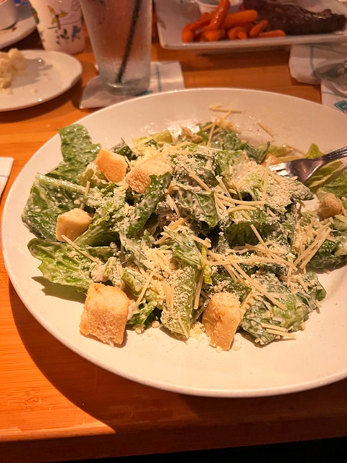 A Caesar salad that respects the classics. Crisp romaine, proper dressing, and shavings of parmesan that don't come from a green can.