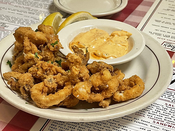 Golden-fried calamari that doesn't need fancy presentation &ndash; just a squeeze of lemon and that perfect crunch that keeps you reaching for more.
