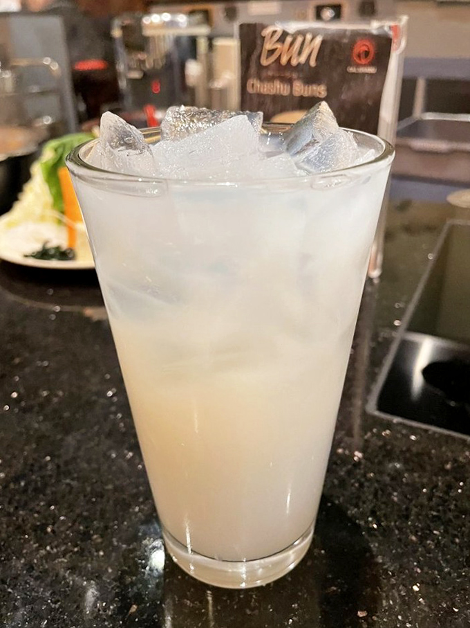 A refreshing milky beverage that cleanses the palate between bites. Think of it as the intermission drink for your taste buds' theater experience.