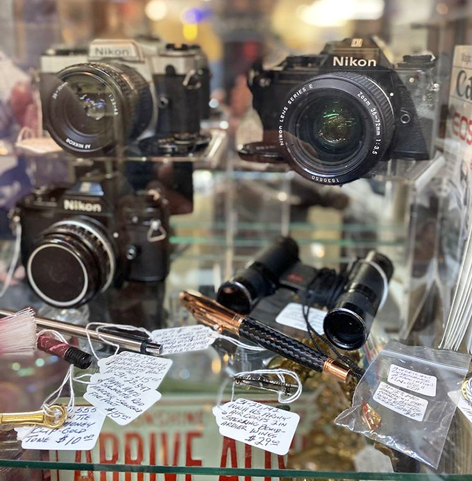 Vintage Nikon cameras that captured family memories long before smartphones existed. These mechanical marvels still work perfectly&mdash;no charging required!