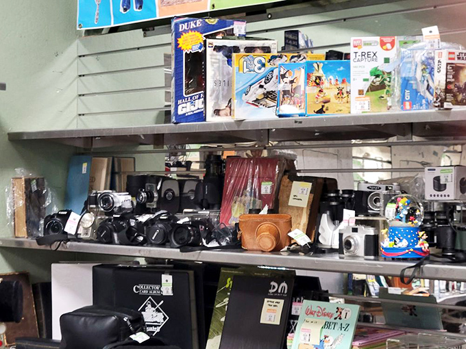 A photographer's time capsule. That Polaroid might have captured someone's prom night in 1982 before landing on this shelf.