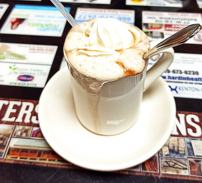 This isn't just coffee, it's a warm hug in a mug. The whipped cream mountain on top is the edible equivalent of a cherry on your day.