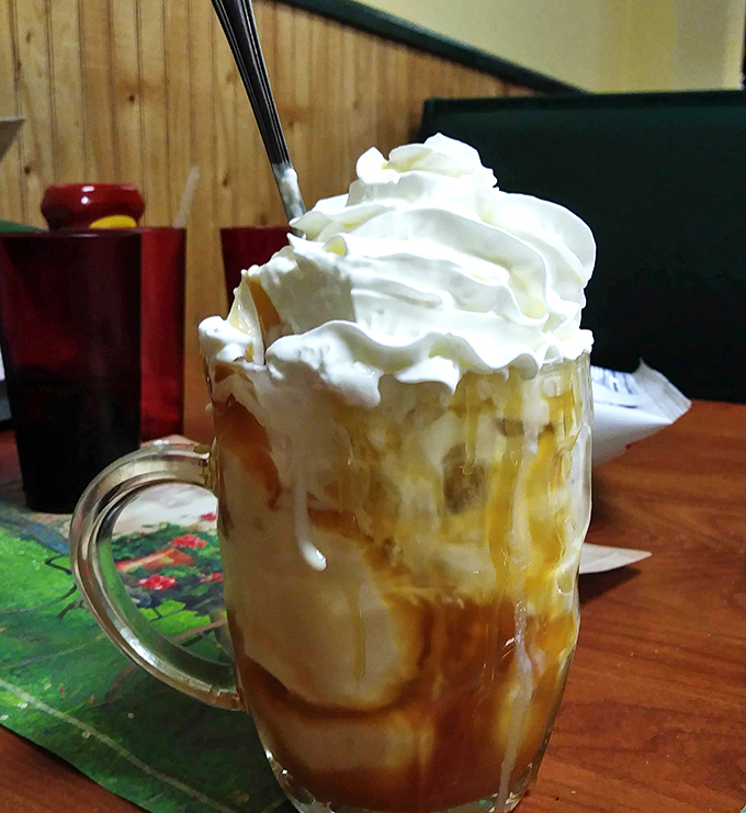 This isn't just a dessert, it's a caramel-drizzled tower of happiness that makes dieting seem like a terrible life choice.