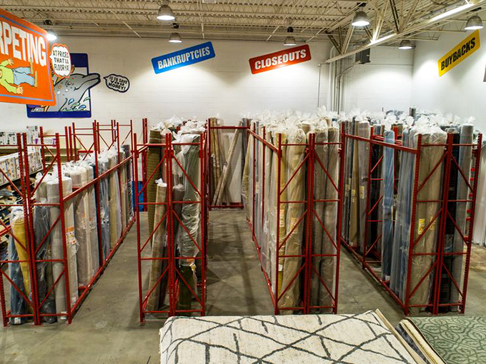 Carpet kingdom where floor coverings come to find new homes. That geometric pattern would cost you triple elsewhere, but here it's practically begging to beautify your living room.