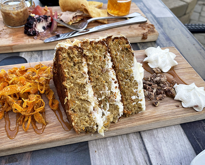 Layer upon layer of moist carrot cake tells a sweet story of indulgence that's worth every calorie-laden forkful.