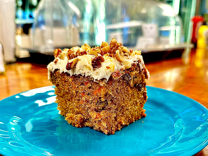 This carrot cake isn't just dessert&mdash;it's an event. That cream cheese frosting and those candied nuts are performing a beautiful duet on a turquoise stage. 