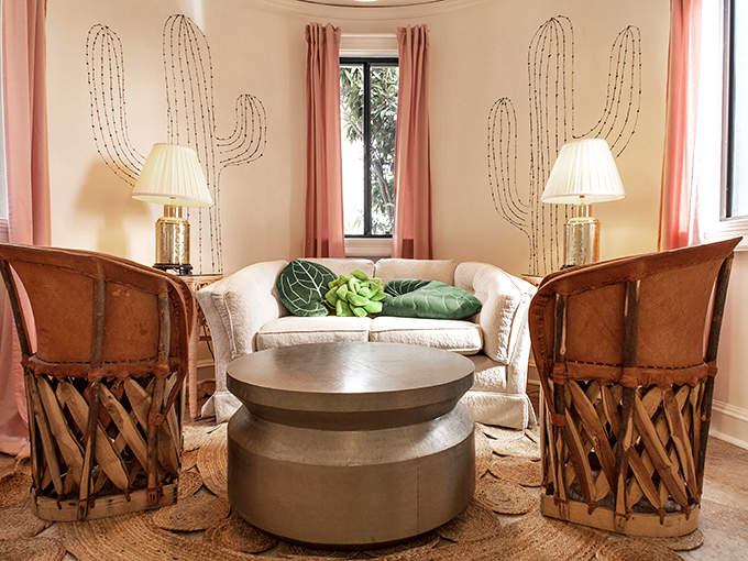 Desert chic meets old-world elegance in this sitting area, where wire cactus art and plush seating create California's answer to Moroccan luxury.