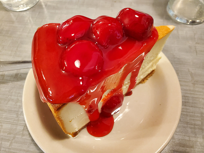 Cherry cheesecake that makes time stand still. That glistening ruby topping is the crown jewel of the dessert kingdom.