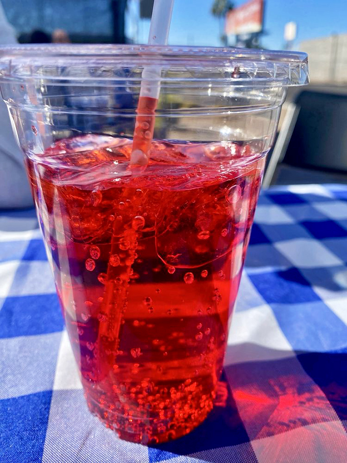 Even the drinks here are photogenic &ndash; this cherry soda practically winks at you from its cup on a classic checkered tablecloth.