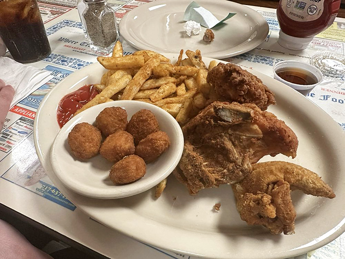 Fried chicken and hush puppies that would make your Southern grandmother nod in approval&mdash;crispy, golden, and utterly unpretentious.
