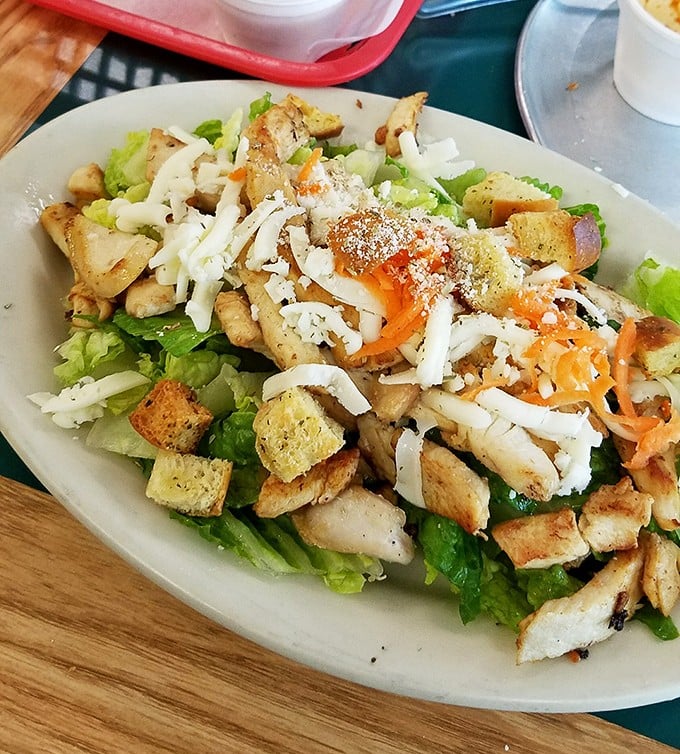 A chicken Caesar salad that doesn't apologize for being exactly what it should be &ndash; fresh, generous, and proof that not everything delicious requires melted cheese.