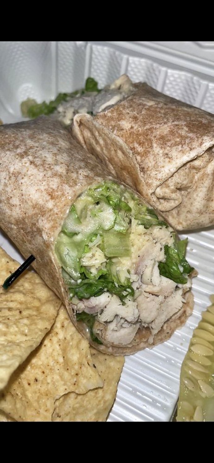 This chicken Caesar wrap brings Rome to Philly, with grilled chicken and crisp romaine embraced by a tortilla that's been toasted to golden perfection.