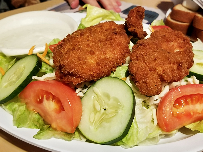 Fresh greens playing supporting actor to the main event, because even chicken needs a sidekick sometimes.