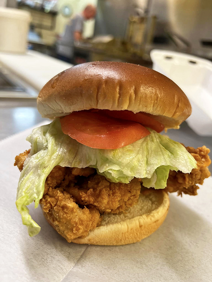 The humble chicken sandwich elevated to art form&mdash;a generous portion of crispy chicken breast with fresh veggies on a soft bun that puts fast food to shame.