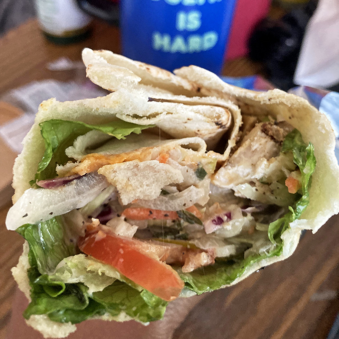 Fresh ingredients playing together like a well-rehearsed jazz quartet. This chicken wrap hits all the right notes without showing off.