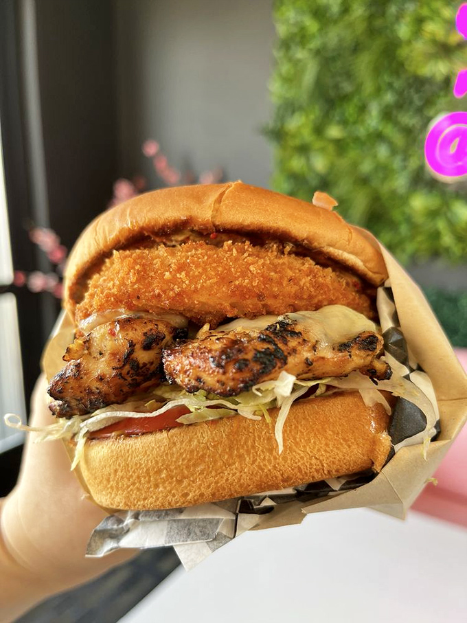 A sandwich that demands respect &ndash; crispy chicken, fresh toppings, and a bun that's somehow both substantial and delicate. The perfect handheld masterpiece.