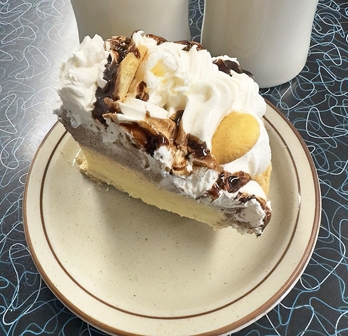 Not all heroes wear capes&mdash;some wear whipped cream, bananas, and chocolate drizzle atop a throne of custard filling.