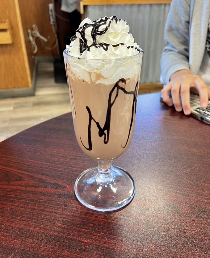 This chocolate creation topped with whipped cream and drizzled with chocolate sauce isn't just a drink – it's dessert with a straw.