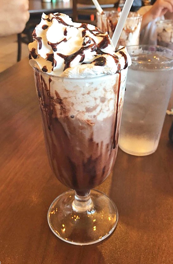 This chocolate milkshake isn't just a drink, it's a tower of indulgence that makes you wonder why we ever settled for ordinary beverages.