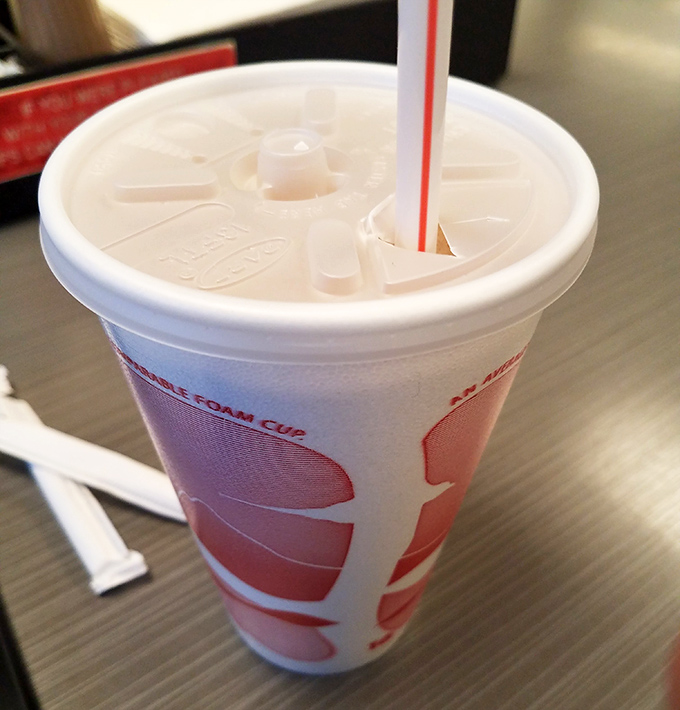 The humble foam cup, containing liquid refreshment that completes the hot dog experience like Astaire completed Rogers.