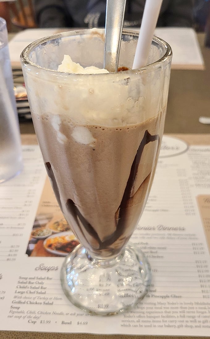 This chocolate milkshake isn't just a drink&mdash;it's a time machine back to when happiness came in a tall glass with whipped cream on top.