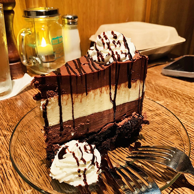 This chocolate layer cake isn't just dessert; it's an event. Three distinct layers of "I'll start my diet tomorrow" in every bite.