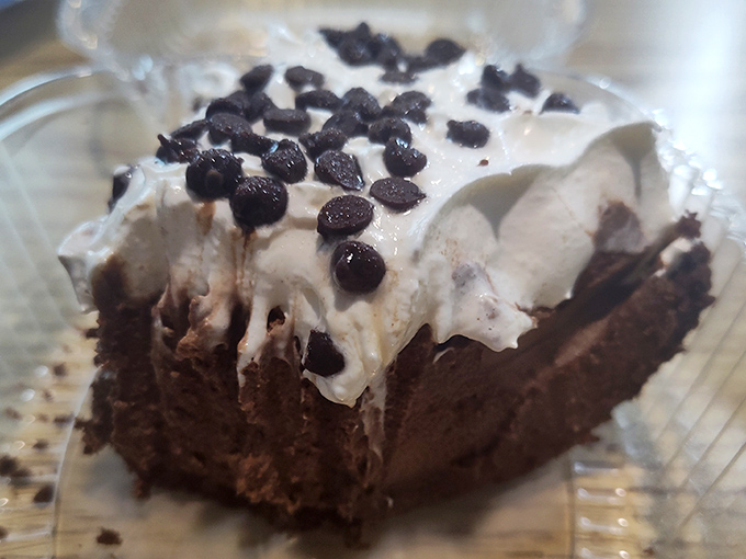Chocolate cream pie topped with enough whipped cream to make your cardiologist wince. Worth every delicious, diet-destroying bite and the extra treadmill time tomorrow.