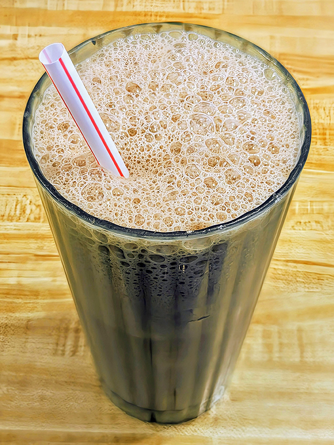 Even the chocolate milk comes with a side of nostalgia, served in a glass that takes you straight back to childhood breakfast victories.