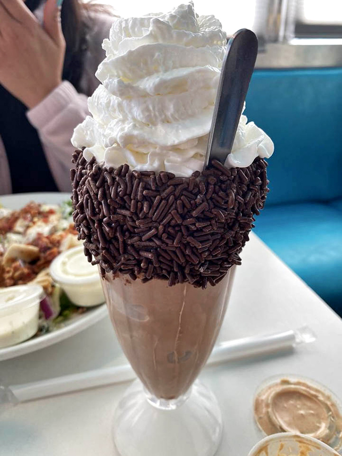 Chocolate shake wearing its Sunday best. Those chocolate sprinkles aren't decoration&mdash;they're a commitment to going above and beyond the call of dessert.