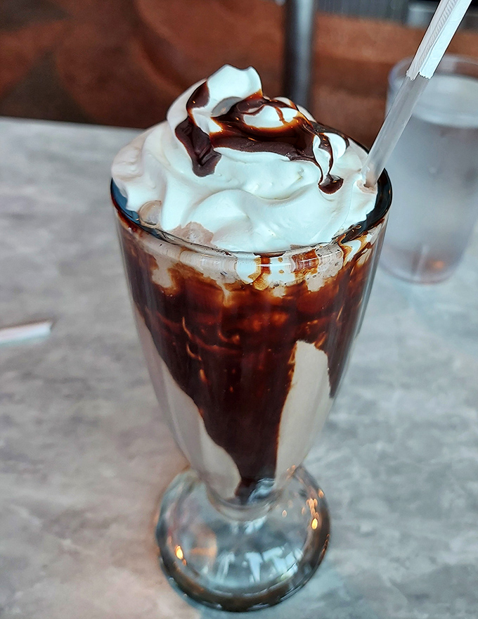 Chocolate milkshake thick enough to support a spoon standing straight up &ndash; the ultimate diner litmus test.