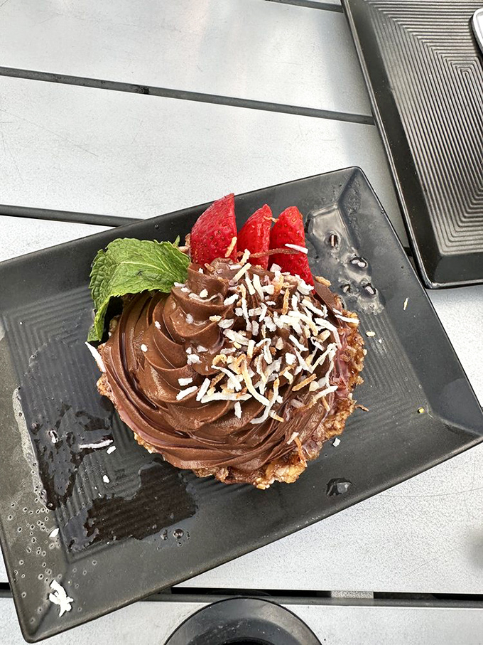 This chocolate tart isn't just dessert; it's the grand finale your taste buds have been rehearsing for all meal long.