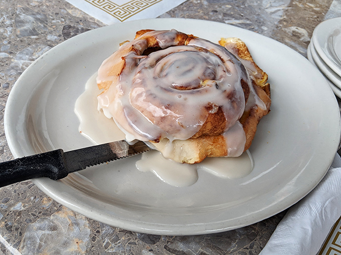 This cinnamon roll isn't just a pastry&mdash;it's an event. Warm, gooey, and dripping with icing that's making a break for freedom.