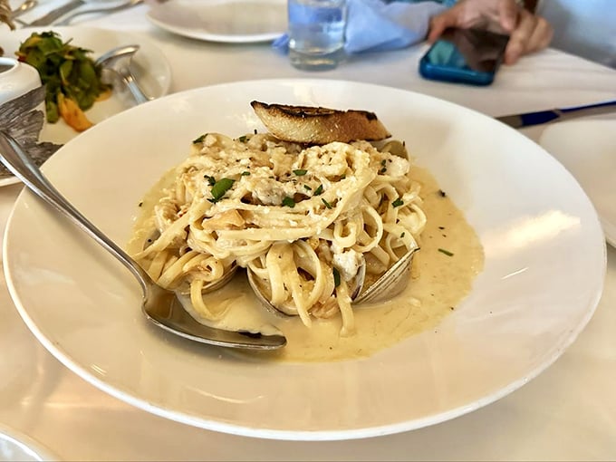 Linguine and clams swimming in a buttery sea of perfection&mdash;pasta that makes you want to cancel your actual trip to Italy.