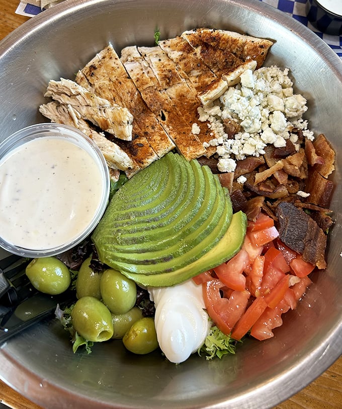 This isn't just a salad&mdash;it's a perfectly composed symphony of protein, greens, and that sliced avocado deserves its own fan club.