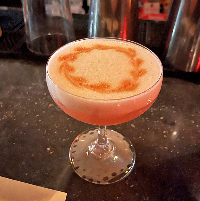 A cocktail that's part science, part art, and all delicious. That foam crown deserves its own royal title.