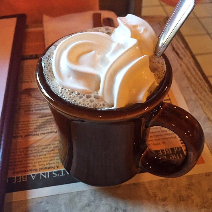 Hot chocolate that doesn't come from a packet, topped with a cloud of whipped cream. Childhood nostalgia in a mug, but better than you remember.