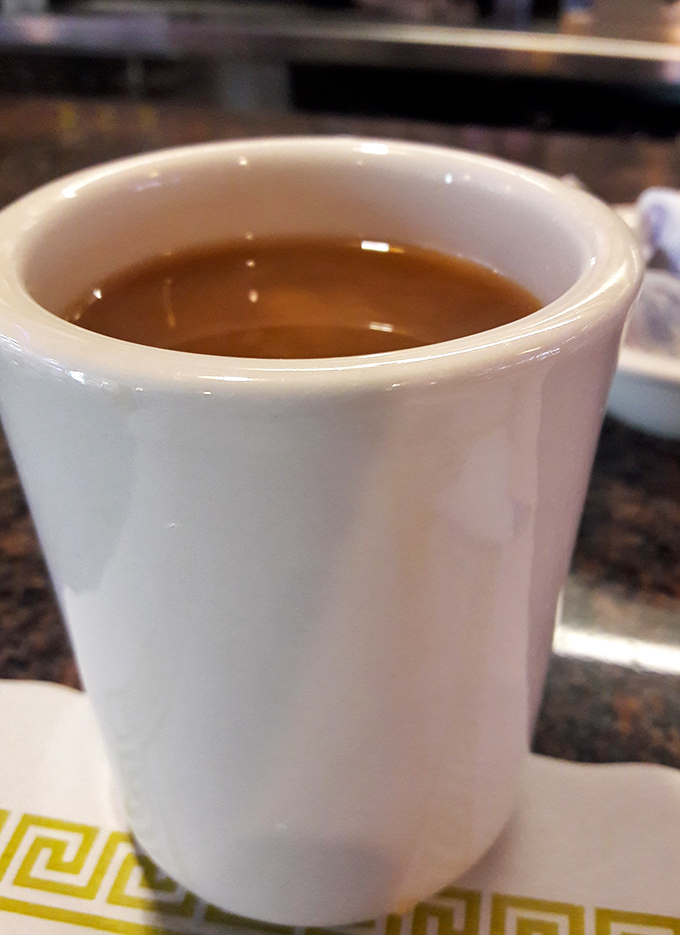 In a world of fancy coffee concoctions, there's something profoundly reassuring about a simple diner mug filled with honest brew. 