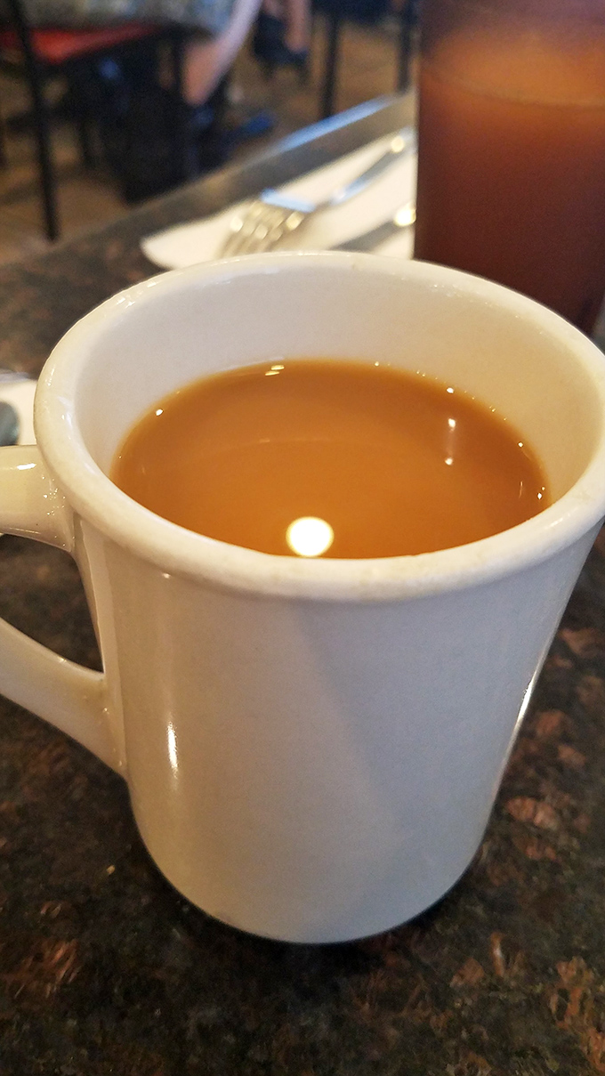 That first sip of diner coffee &ndash; the liquid courage needed before making important breakfast decisions.