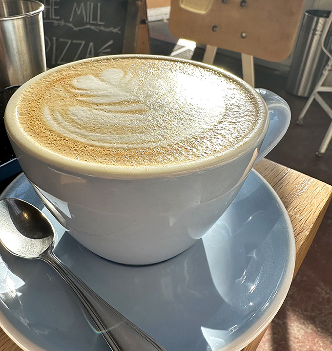 Coffee art so pretty you almost don't want to drink it. Almost. The foam-to-espresso ratio here is what mathematicians call "the golden ratio of morning happiness."