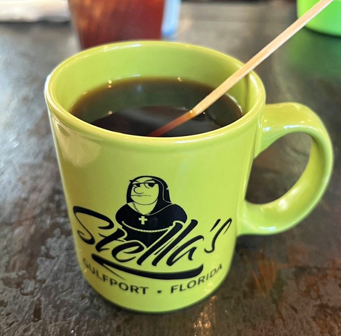 The lime green mug isn't just a vessel&mdash;it's a promise. This coffee will jumpstart your day with the same boldness as the diner's exterior.